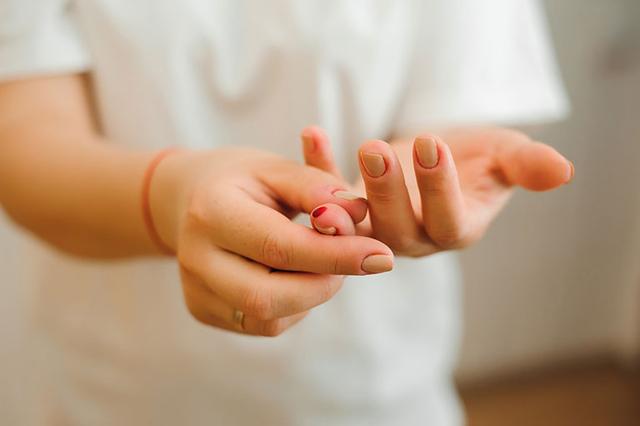 How do I take a finger-prick blood test?